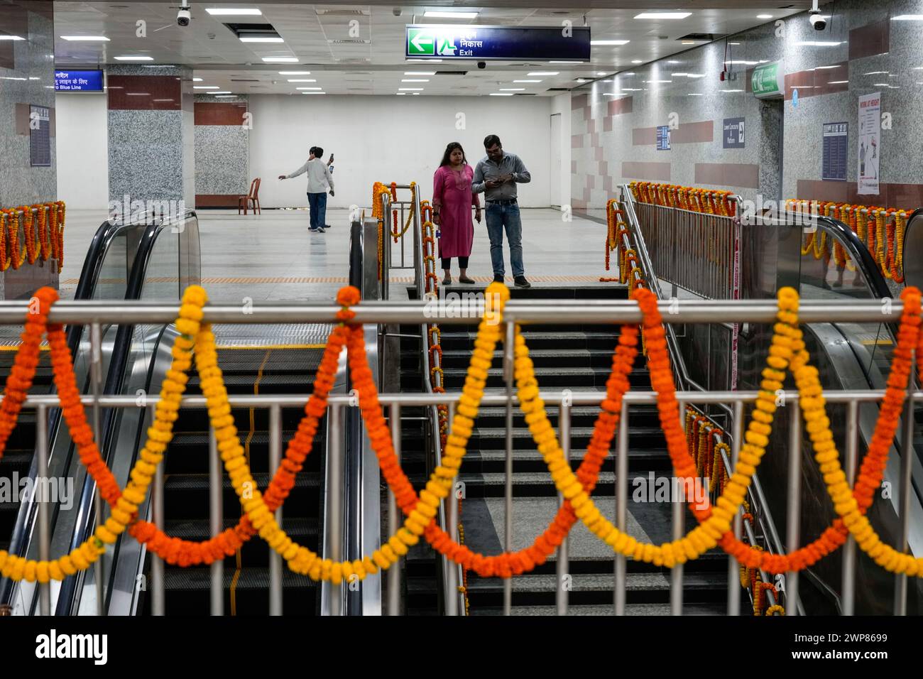 Commuters arrive at the newly inaugurated Esplanade Metro station in ...
