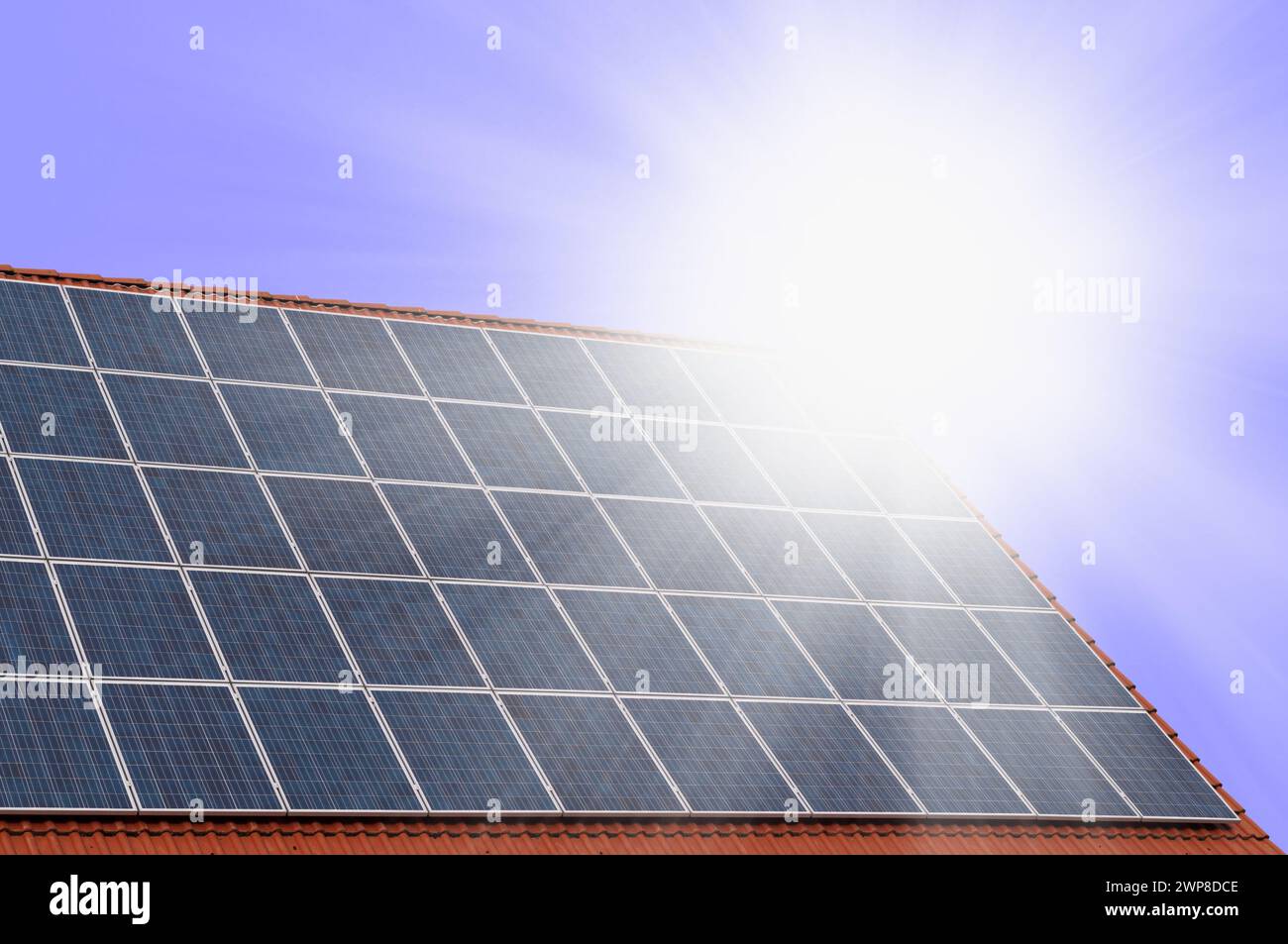 Solar panel roof and building under bright sunlight Stock Photo - Alamy
