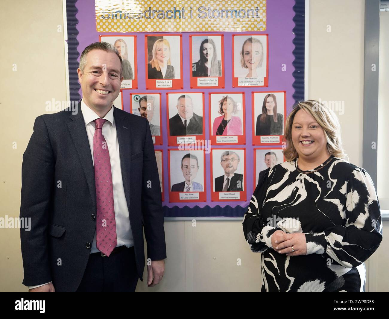 Northern Ireland Education Minister Paul Givan stands in front of ...