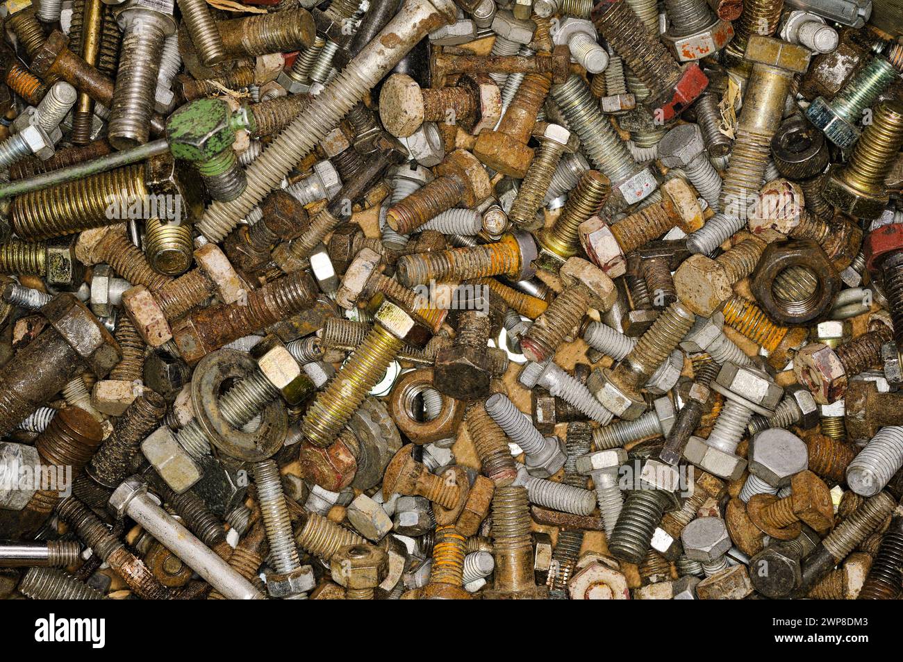 An Accumulation of various used, rusty bolts Stock Photo - Alamy