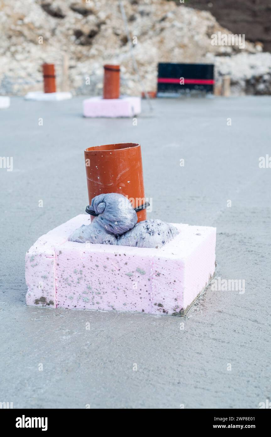 The house connection and sewage connections in a concrete slab on a ...