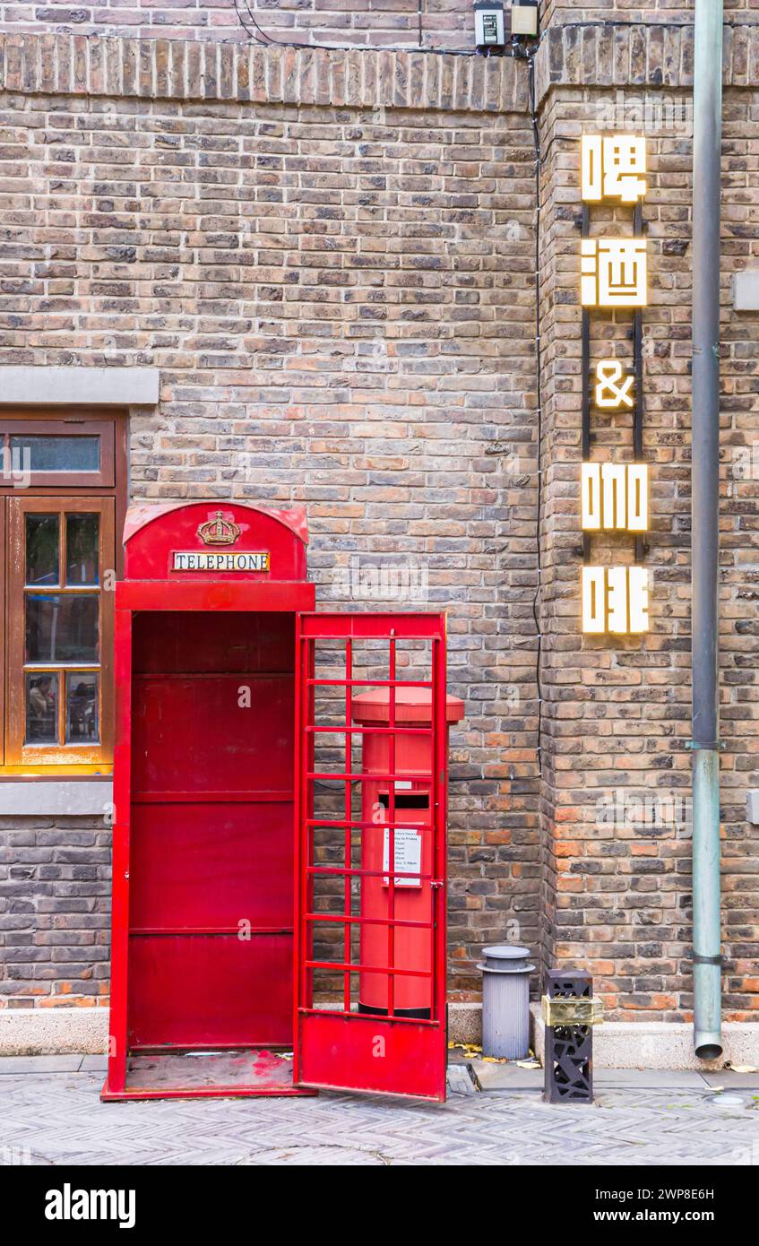 Traditional red English phone booth in the Five Great Avenues of ...