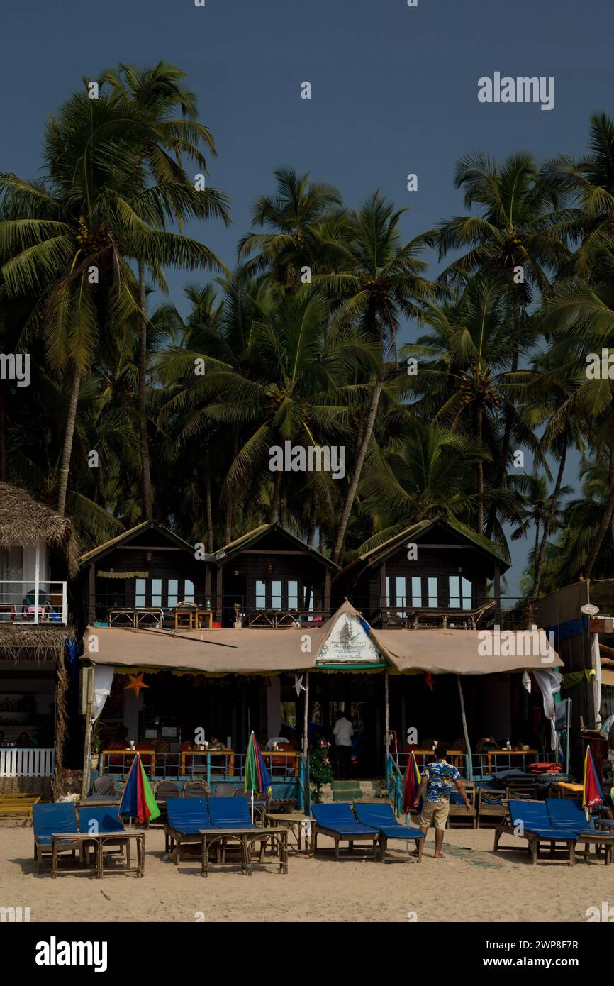 The buildings on a sandy beach of Goa in India Stock Photo - Alamy