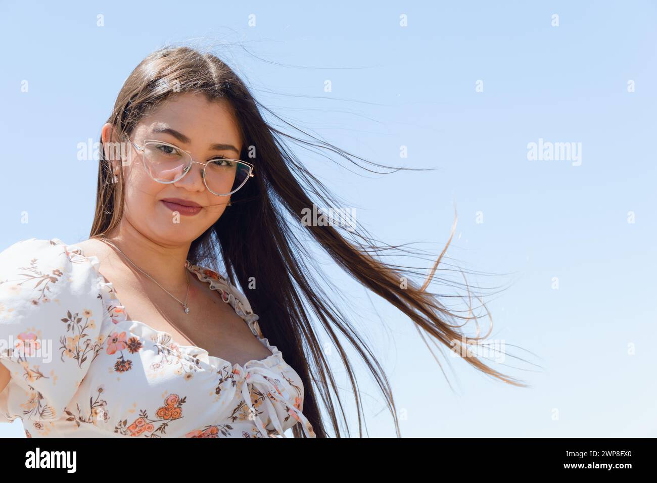 Hair blown in face by wind hi-res stock photography and images - Alamy