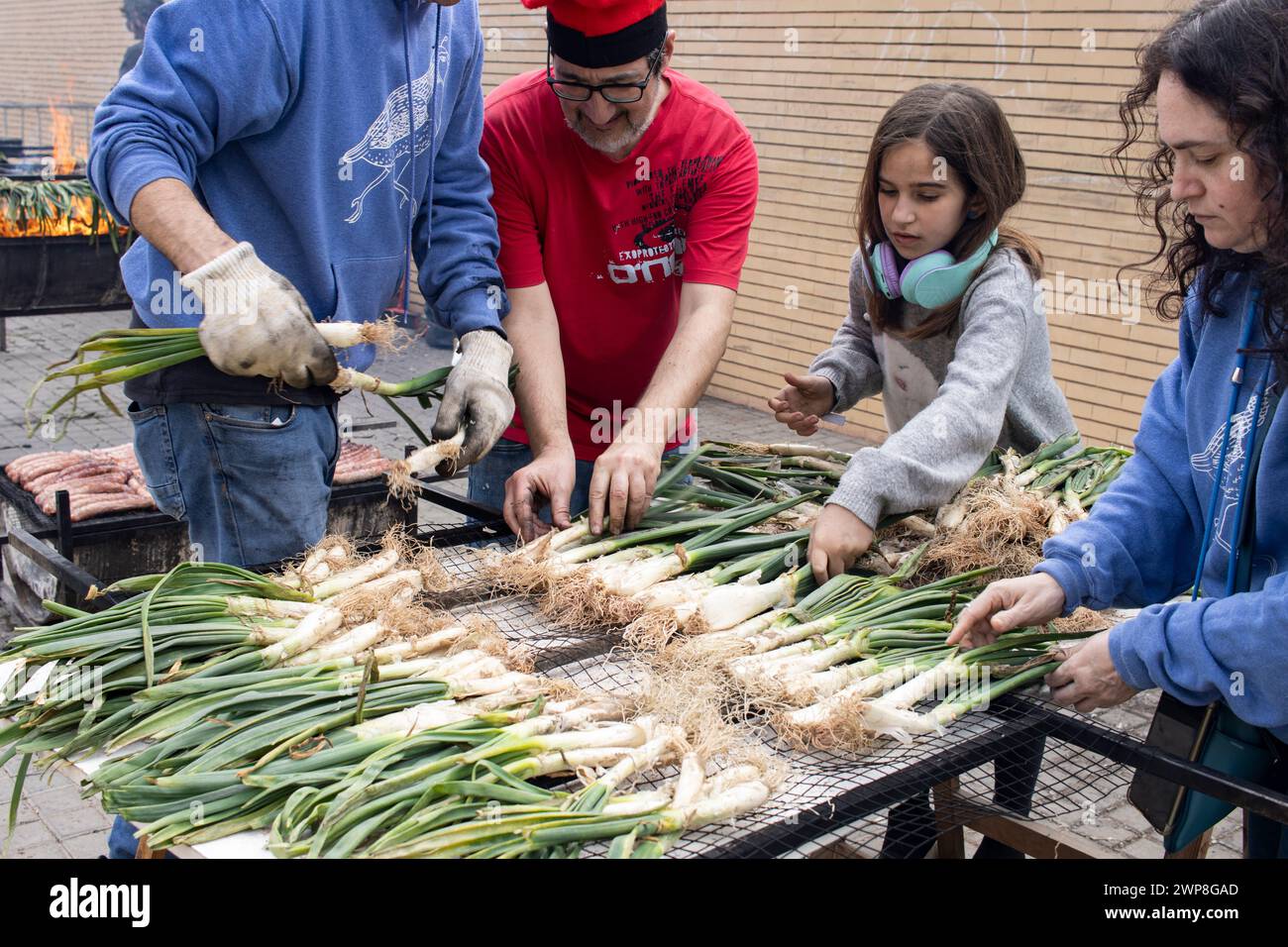 A Local food event, Calcotada in Barcelona, Spain, Catalan people enjoy ...