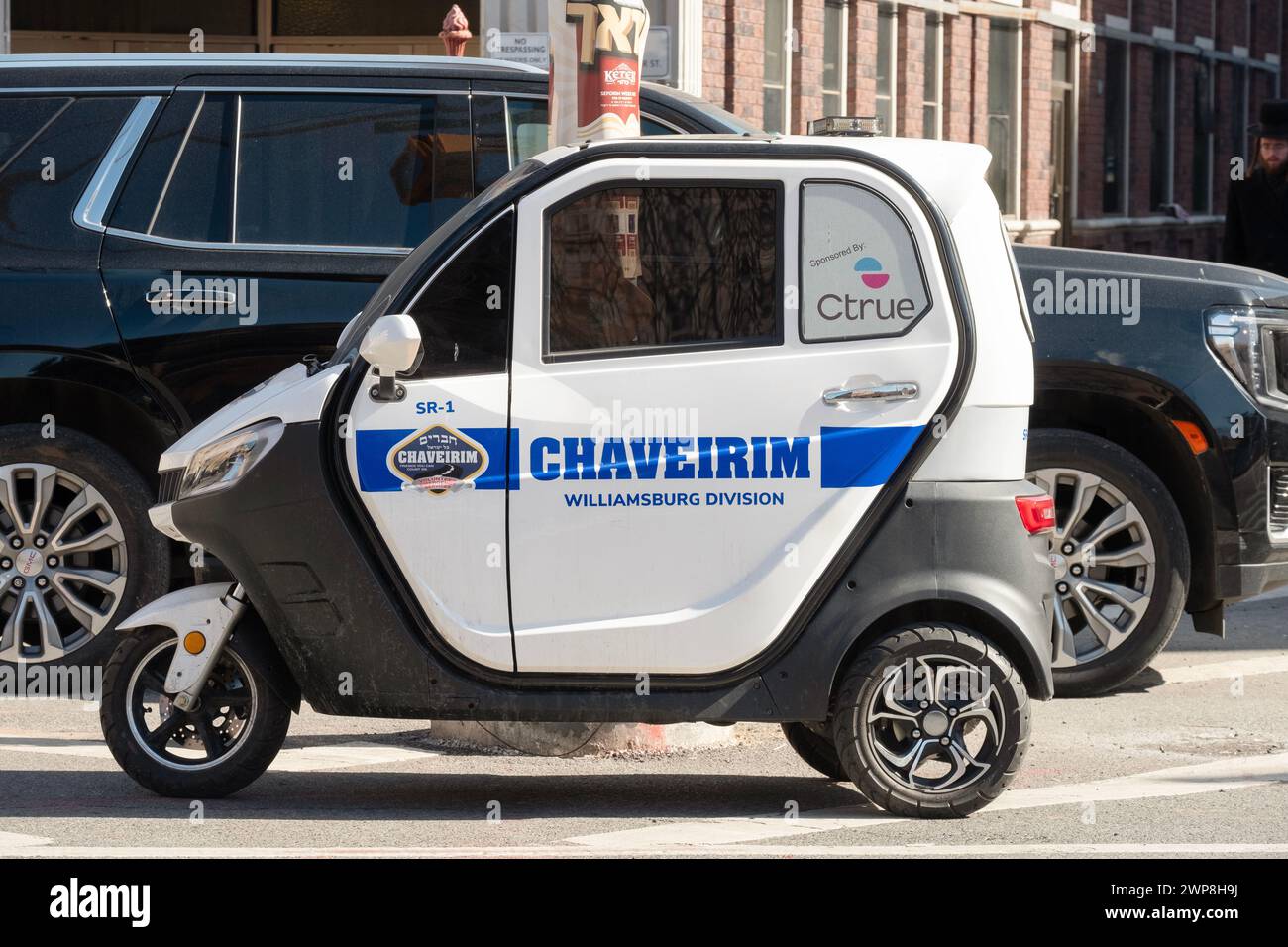 A 3 wheel Chaverim mini-vehicle parked in Williamsburg, Brooklyn, New ...