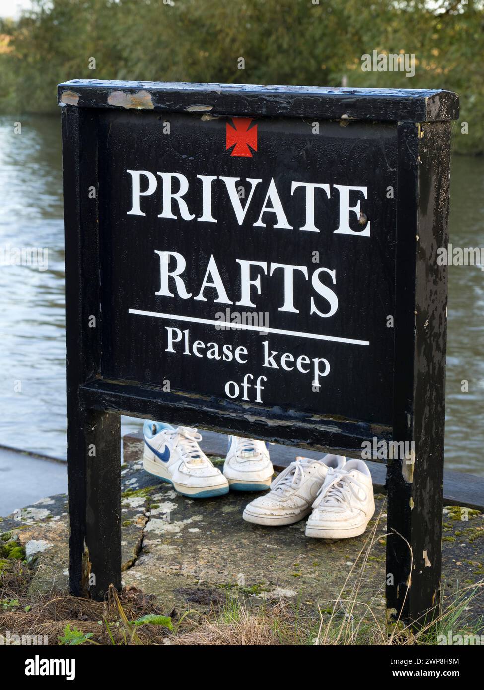 Still life with shoes and sign outside Radley boathouse by the Thames ...