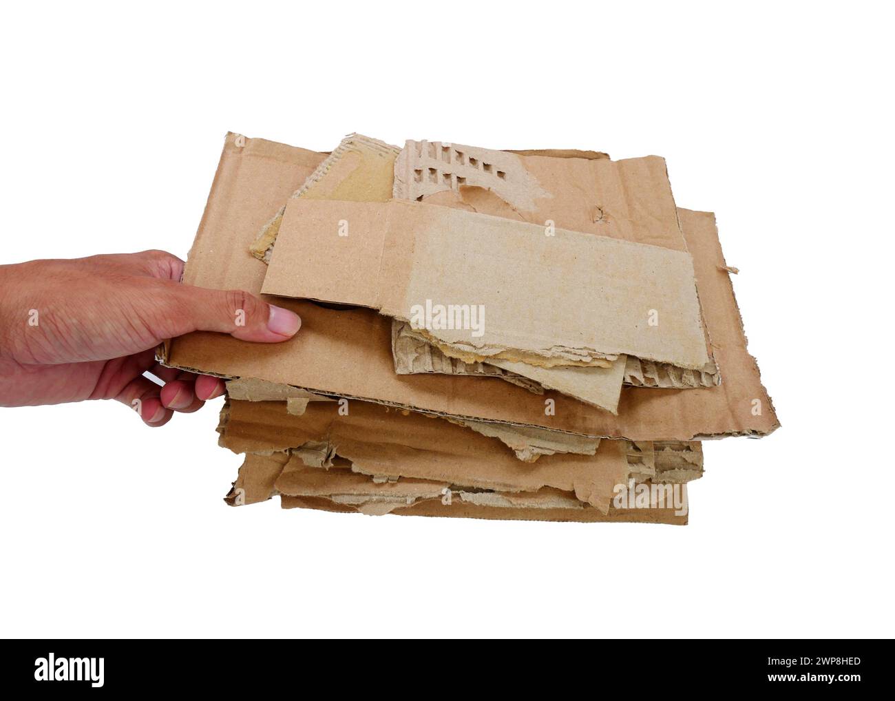 Hand and stack of old Cardboard ripped papers isolated Stock Photo - Alamy
