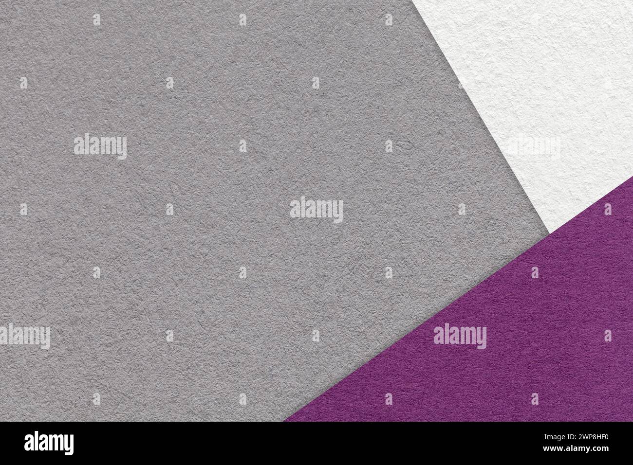 Texture of craft gray color paper background with white and purple ...