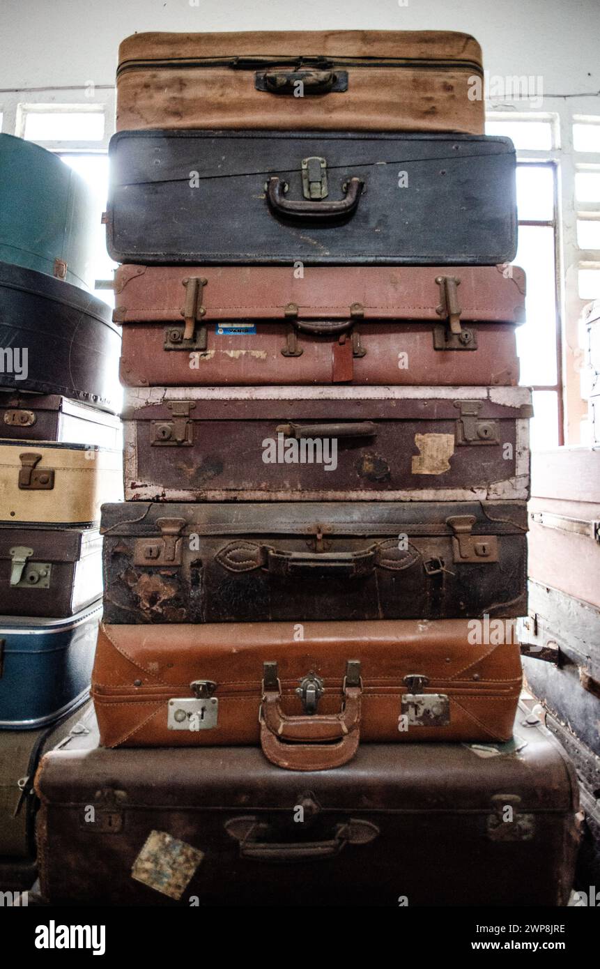 The vintage suitcases stacked on each other Stock Photo - Alamy