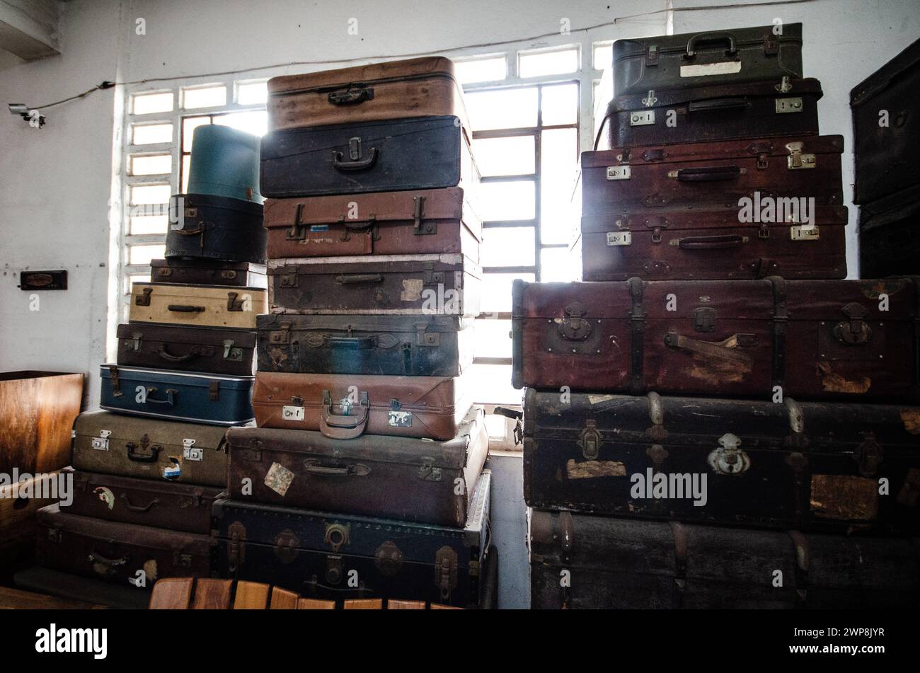 The vintage suitcases stacked on each other Stock Photo - Alamy