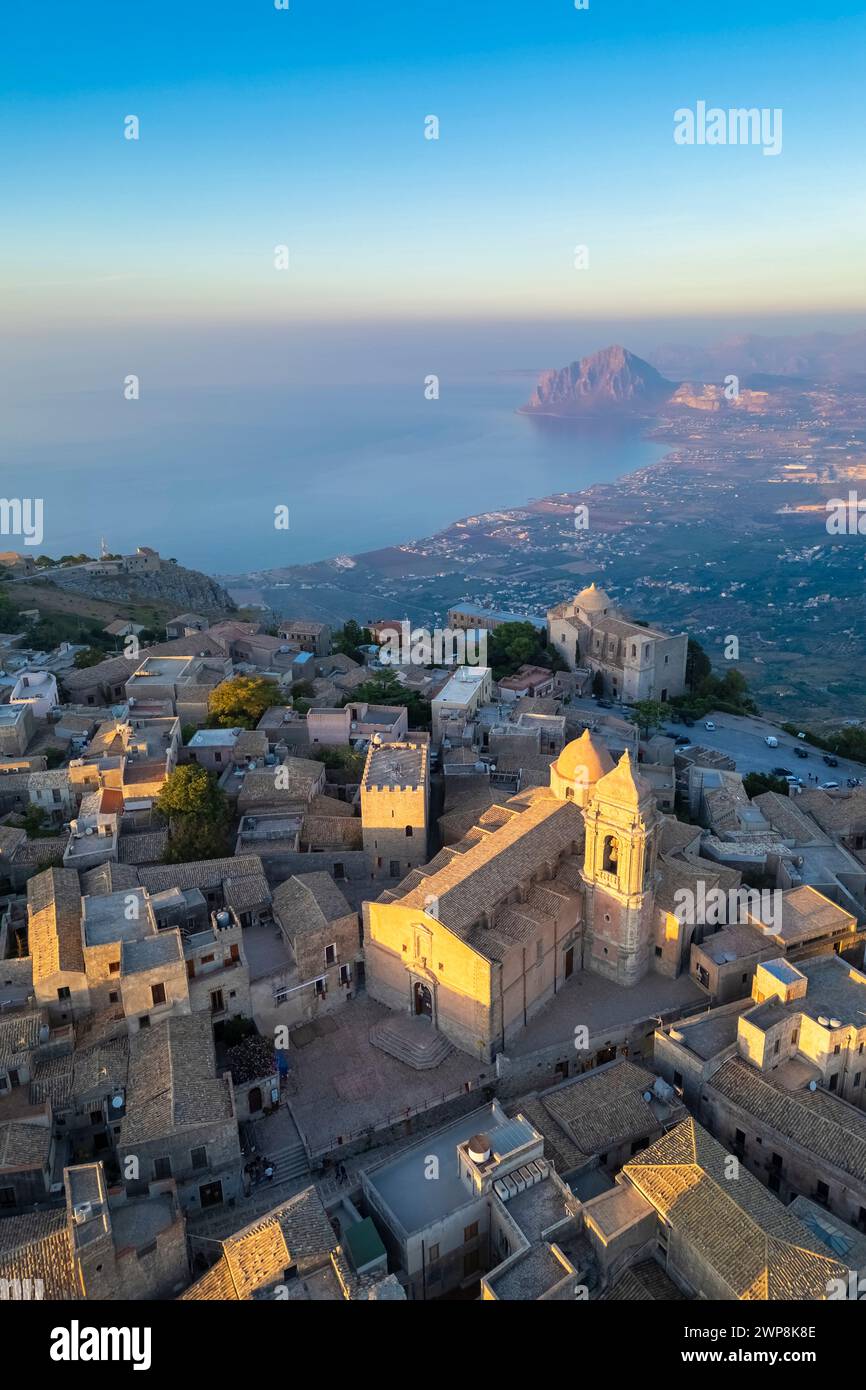Aerial view of the church of San Giuliano of Erice towards Monte Cofano ...