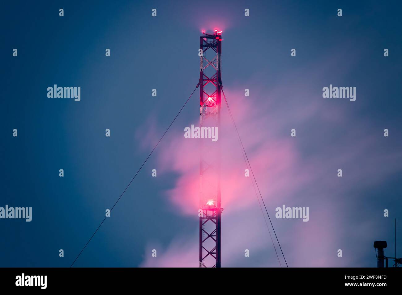 Steam tower at night Stock Photo - Alamy