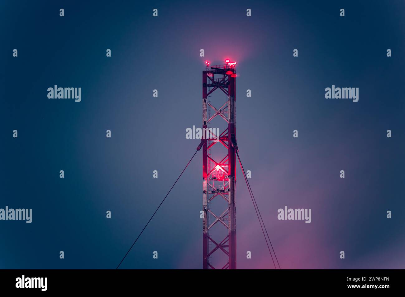 Steam tower at night Stock Photo - Alamy
