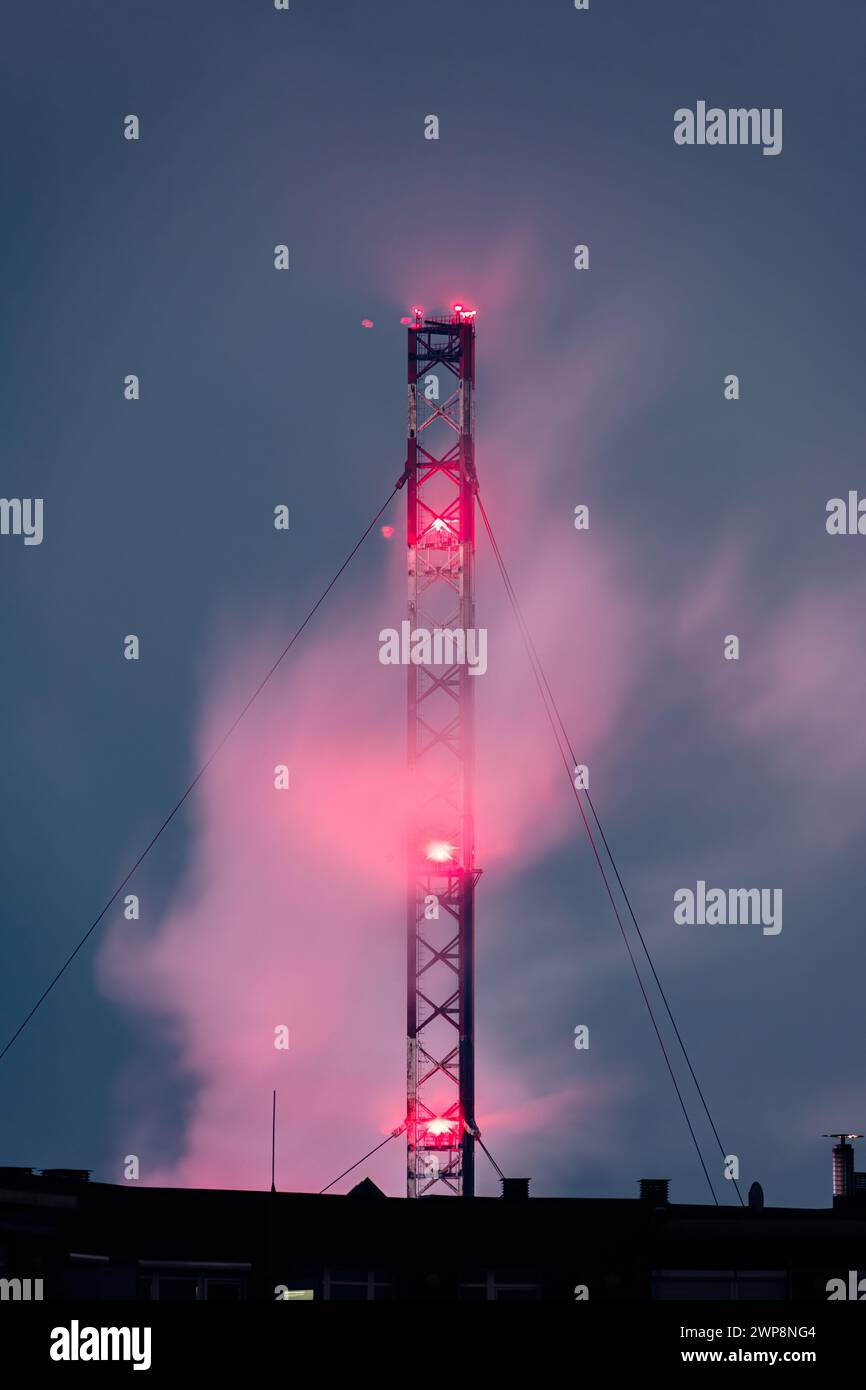 Steam tower at night Stock Photo - Alamy