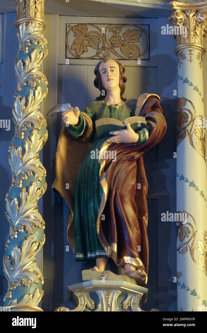 Saint John the Evangelist, statue on High altar in the Parish Church of ...