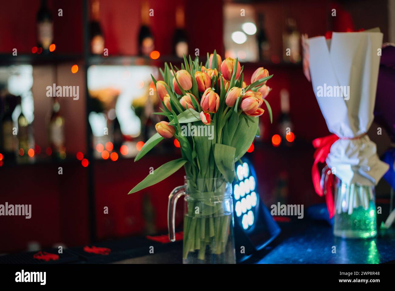 bouquet of tulips on the bar counter. High quality photo Stock Photo ...