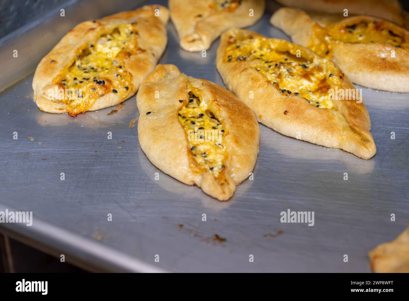 Vintage Oven Delights: Delectable Stuffed Pastries Await Baking in the ...