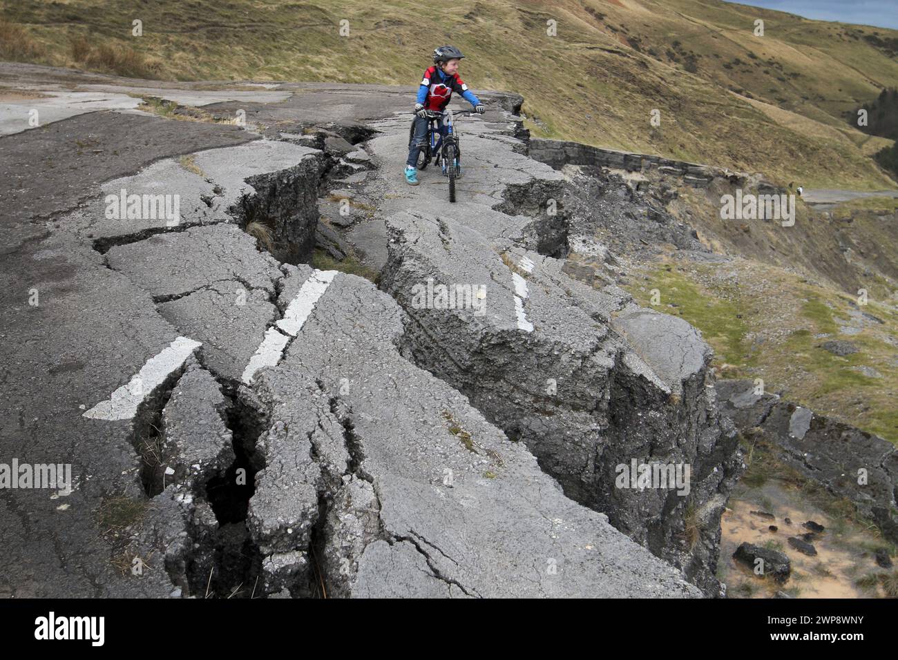 03/03/13 Twisted, snapped and buckled, a once sinuous strip of black ...