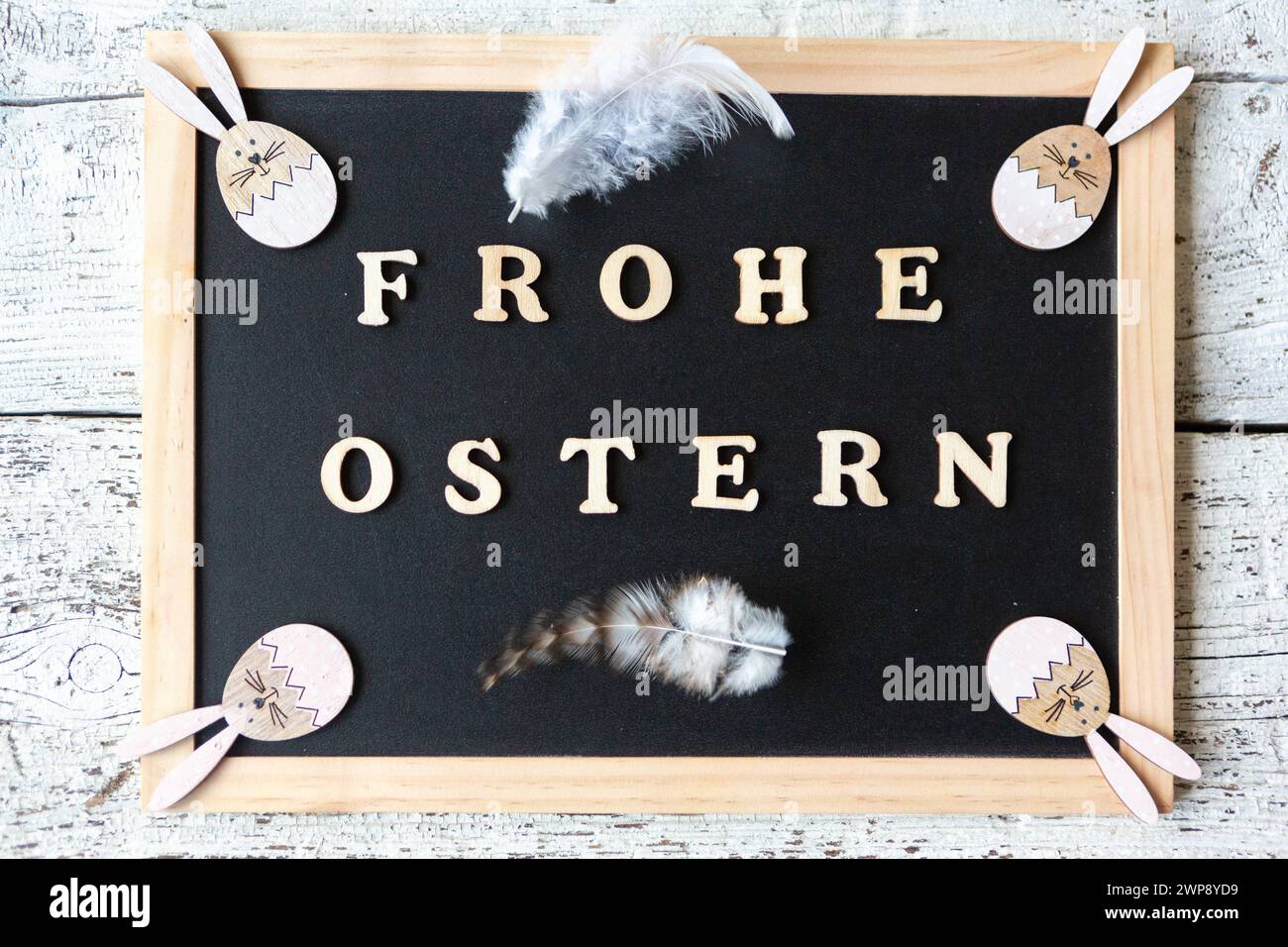 3 March 2024: Happy Easter, greeting made of wooden letters on a ...