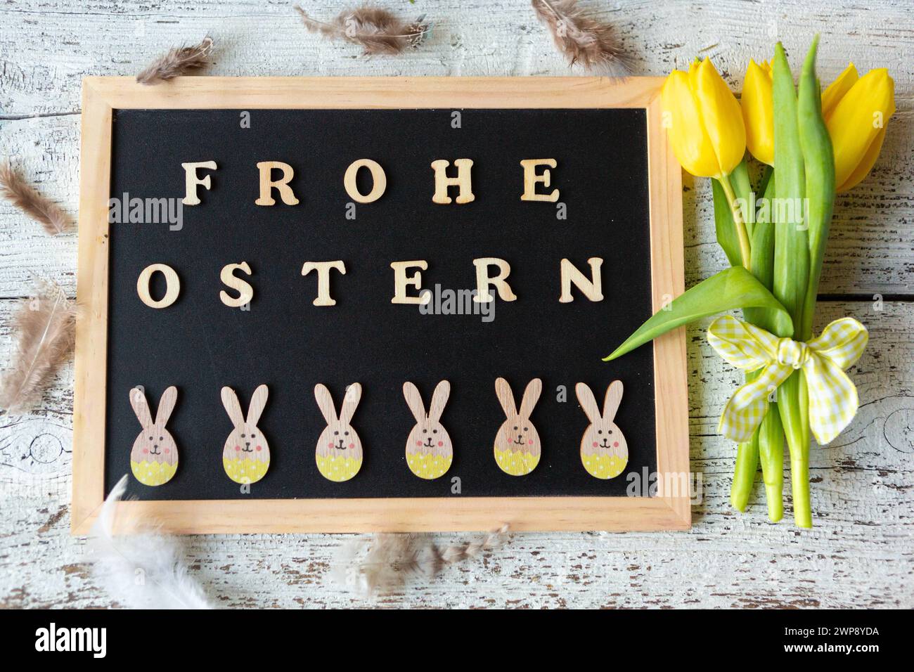 3 March 2024: Happy Easter, greeting made of wooden letters on a ...