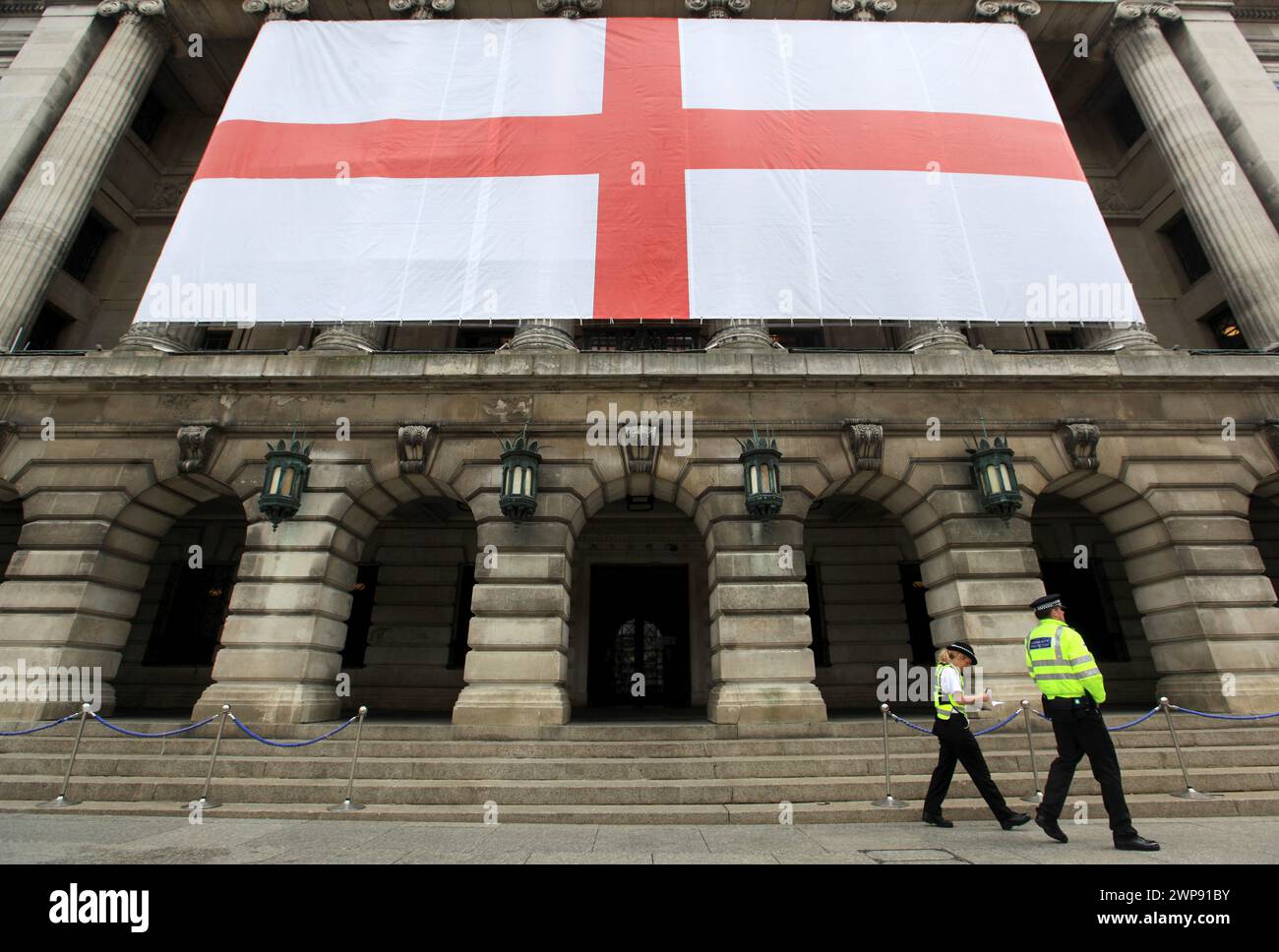 20/04/13 A giant St. George's Cross is unfurled on Nottingham Town Hall ...