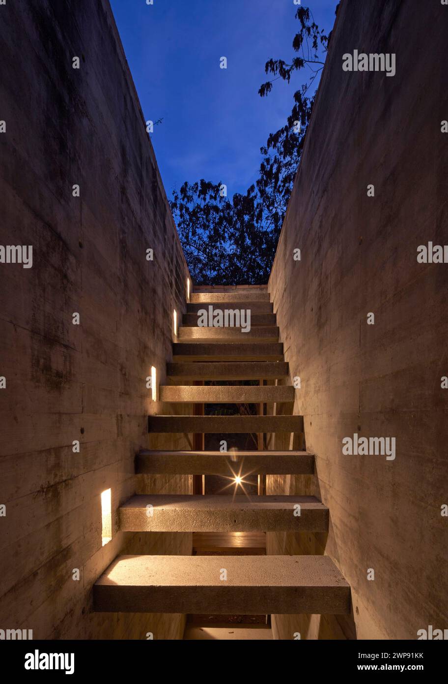 Guest wing stairs at dusk. Casa Cometa, Mazunte, Mexico. Architect ...