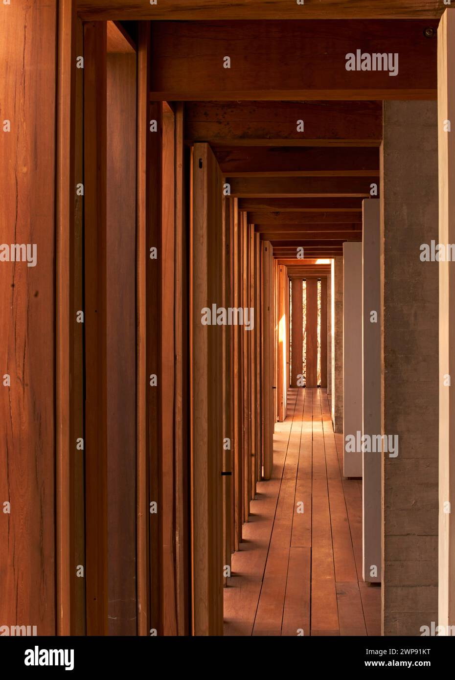 Guest wing corridor. Casa Cometa, Mazunte, Mexico. Architect: Mauricio ...