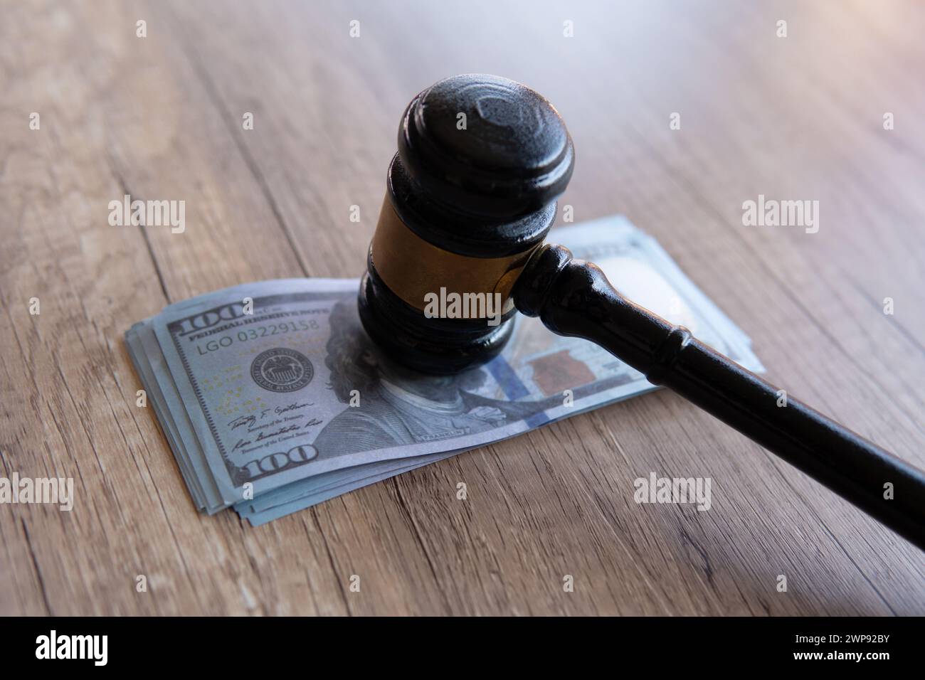 Closeup image of gavel and money. Fine, penalty, bribe concept Stock ...