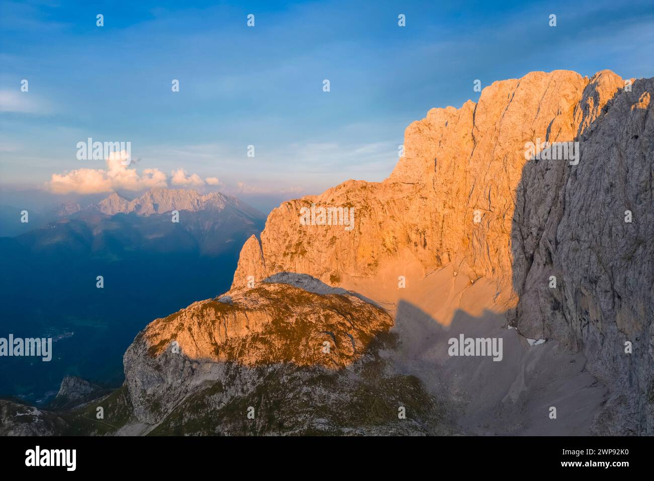 Aerial view of north face of the Presolana at sunset. Val di Scalve ...