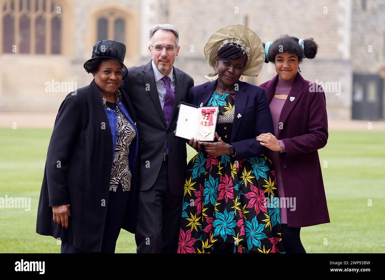 Dame Margaret Aderin-Pocock (2nd right) poses for a photograph with her ...