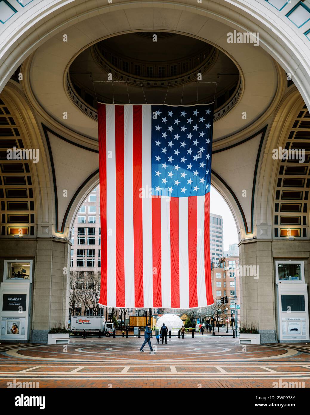 Boston Harbor with large American Flag Stock Photo - Alamy
