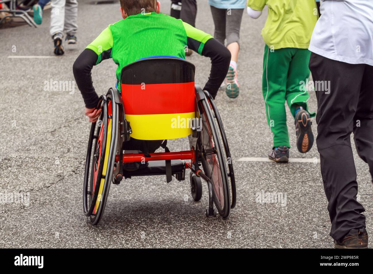 Boy in a sports wheelchair takes part in a children's race Stock Photo ...