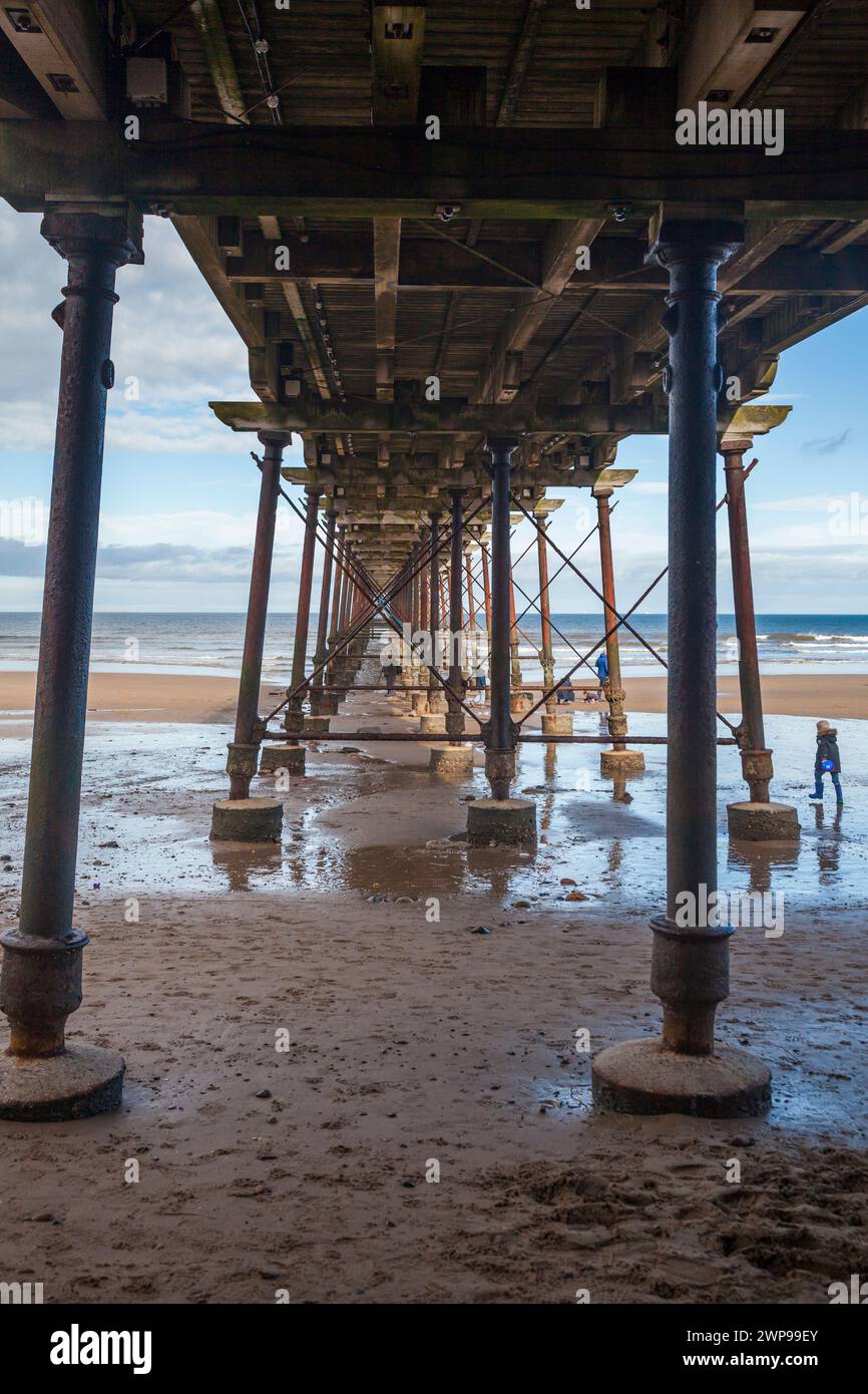 A view underneath the pier and beach area at Saltburn by the Sea ...