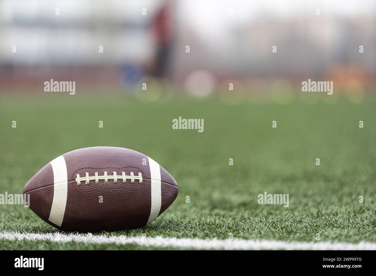 American Football with the Fifty Yard Line Beyond Stock Photo - Alamy