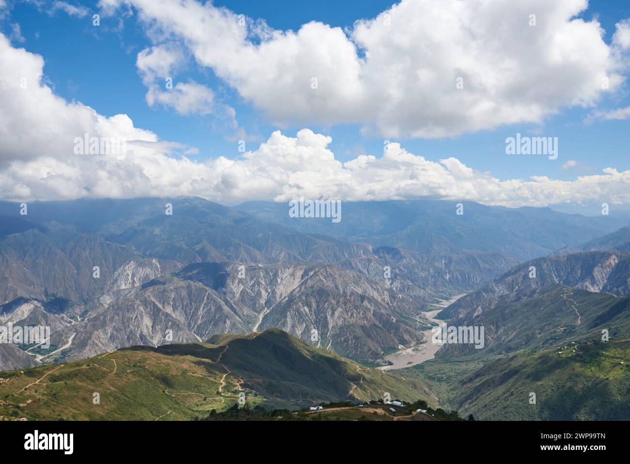 Amazing aerial view, from a flying paraglider, of the Chicamocha Canyon ...