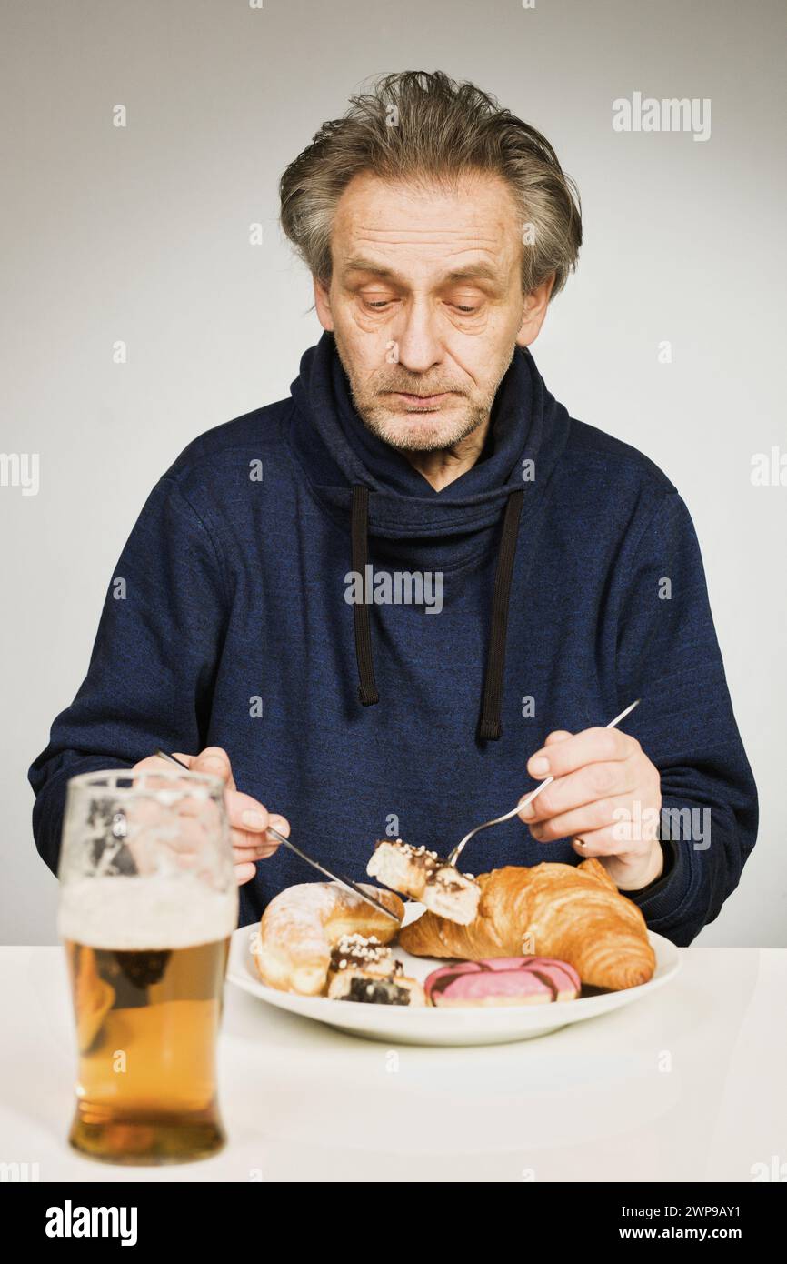 Man breakfast eating sweet hi-res stock photography and images - Alamy