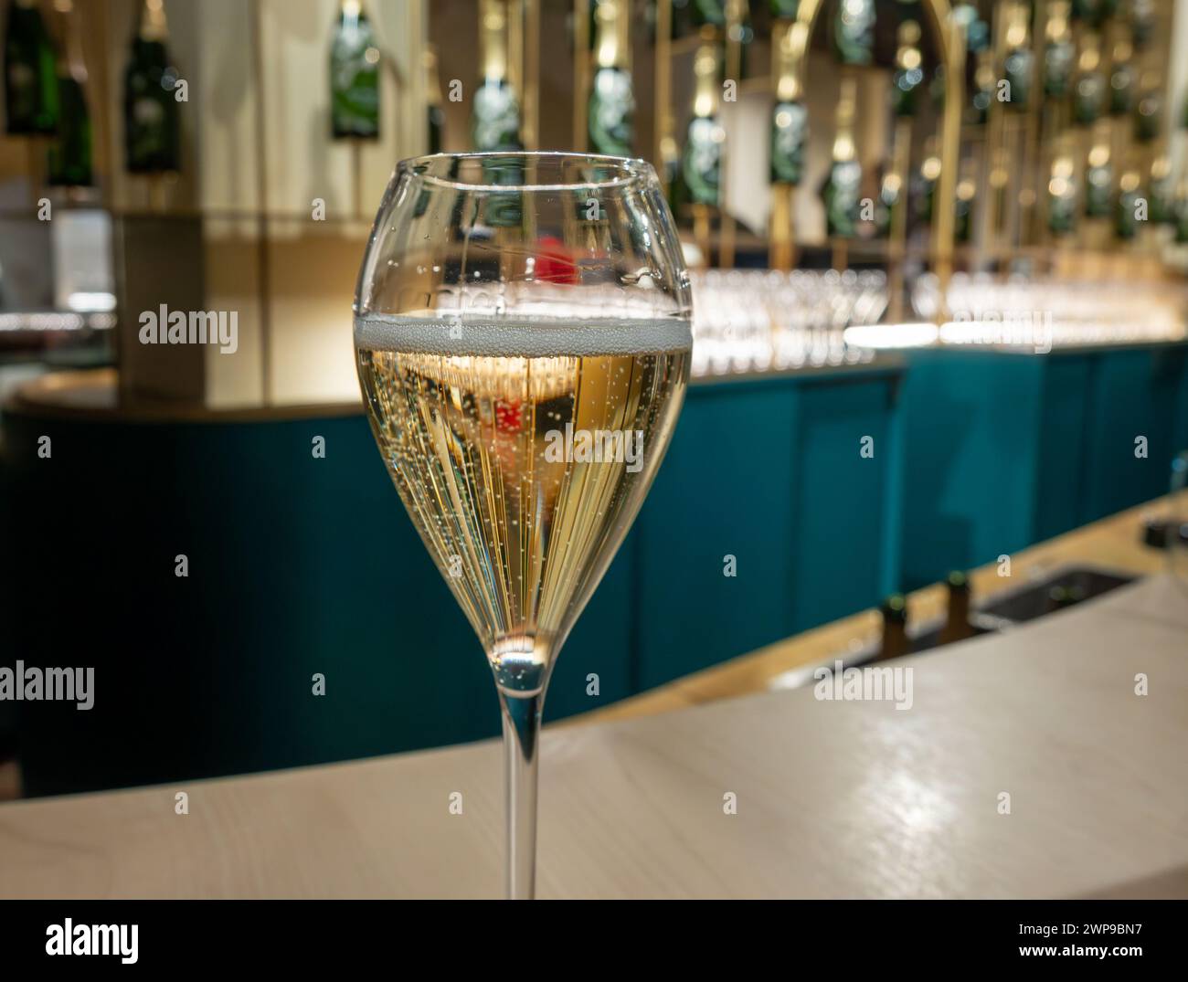 Glass with little bubbles, tasting of sparkling wine champagne on ...