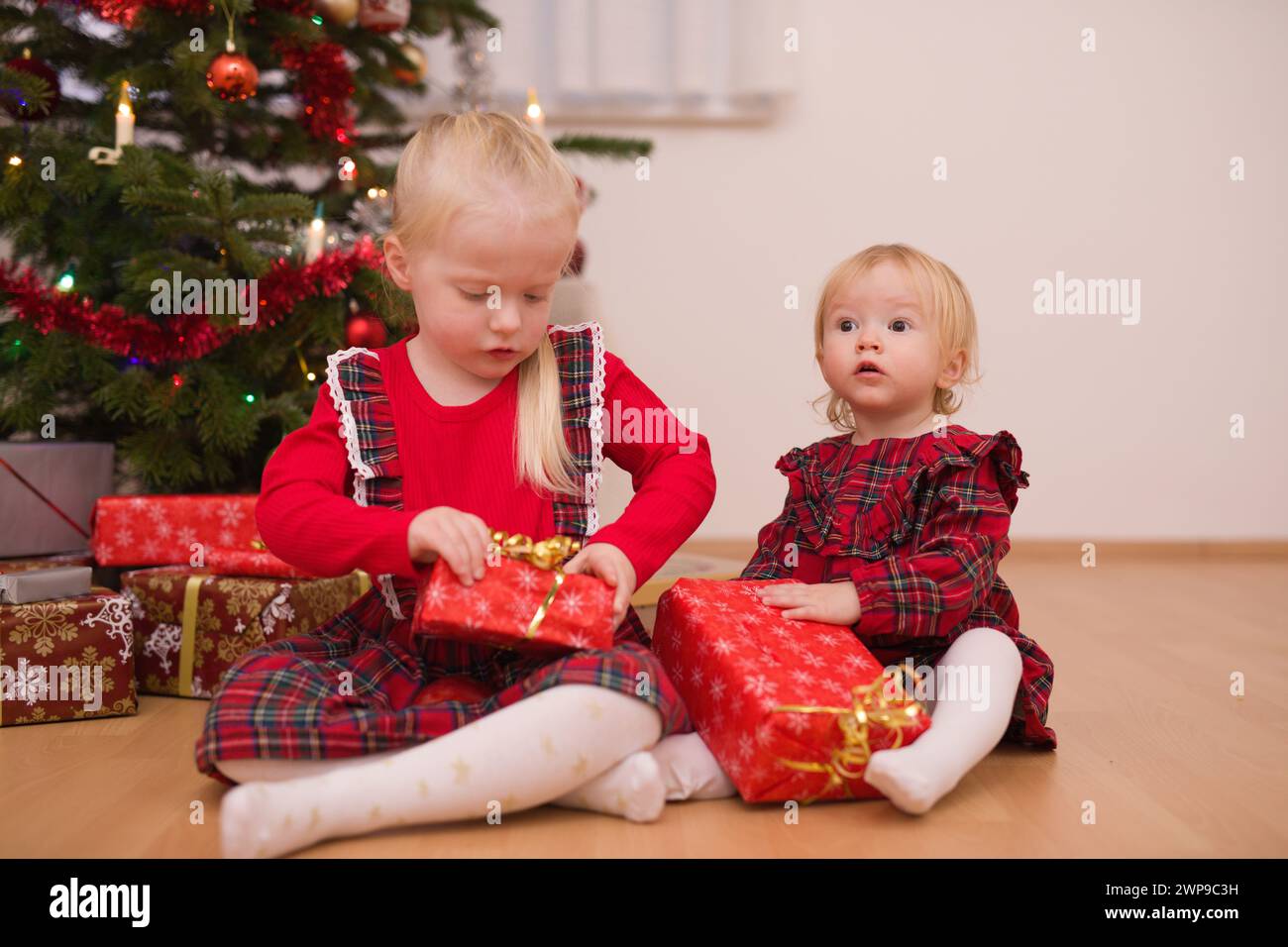 Baby christmas tree feast girl hi-res stock photography and images - Alamy