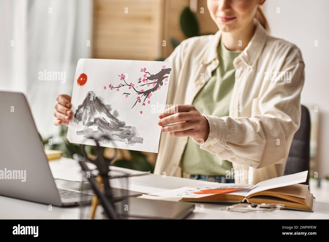 Girl looking at drawings hi-res stock photography and images - Alamy