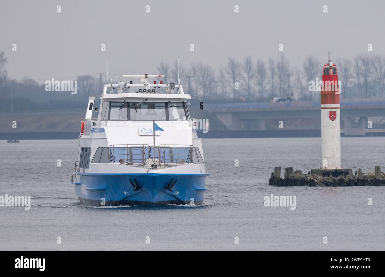 Stralsund, Germany. 06th Mar, 2024. A ship sails into the port of ...