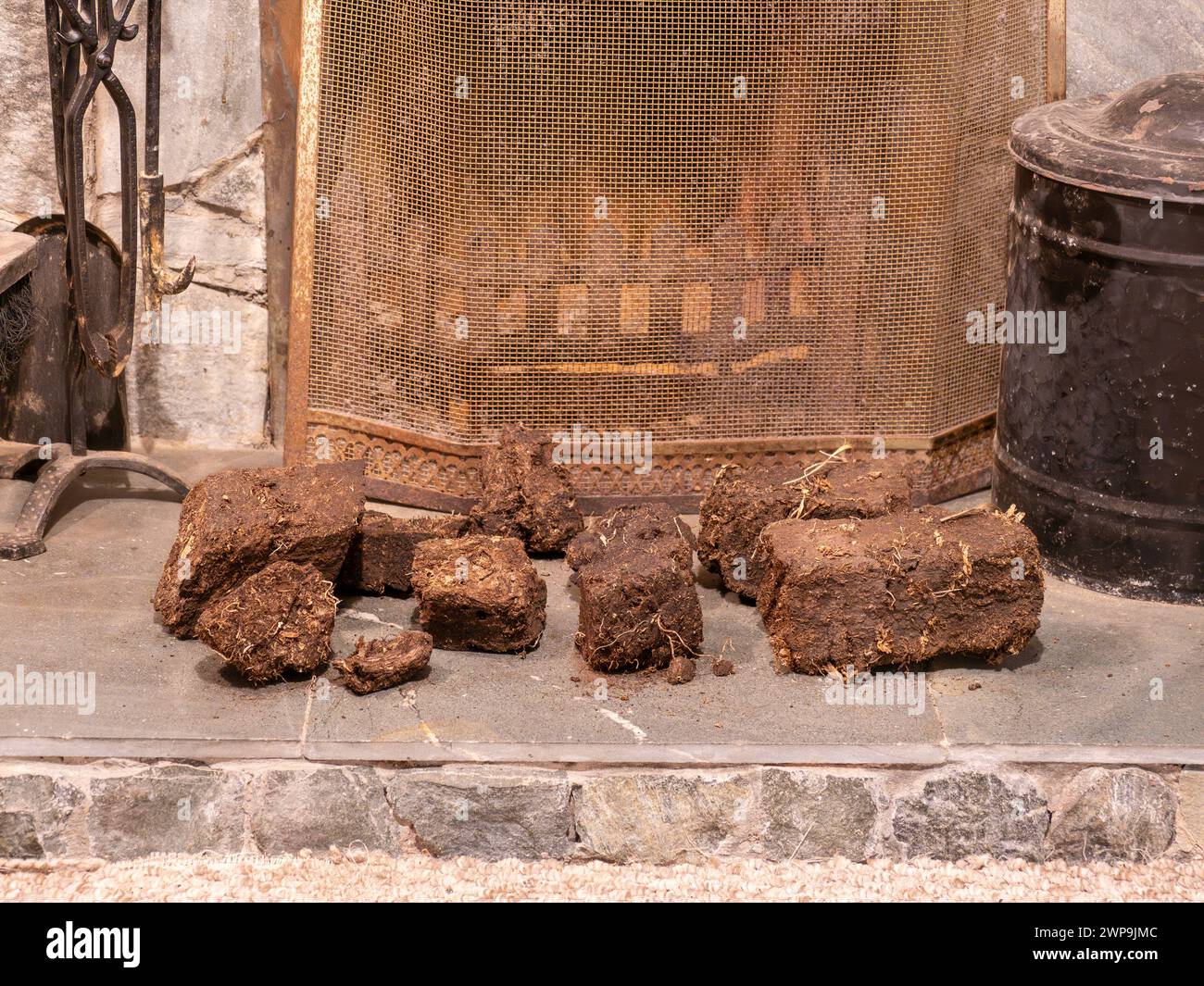 Peat being used as fuel on a house fire in Portnahaven on Islay ...