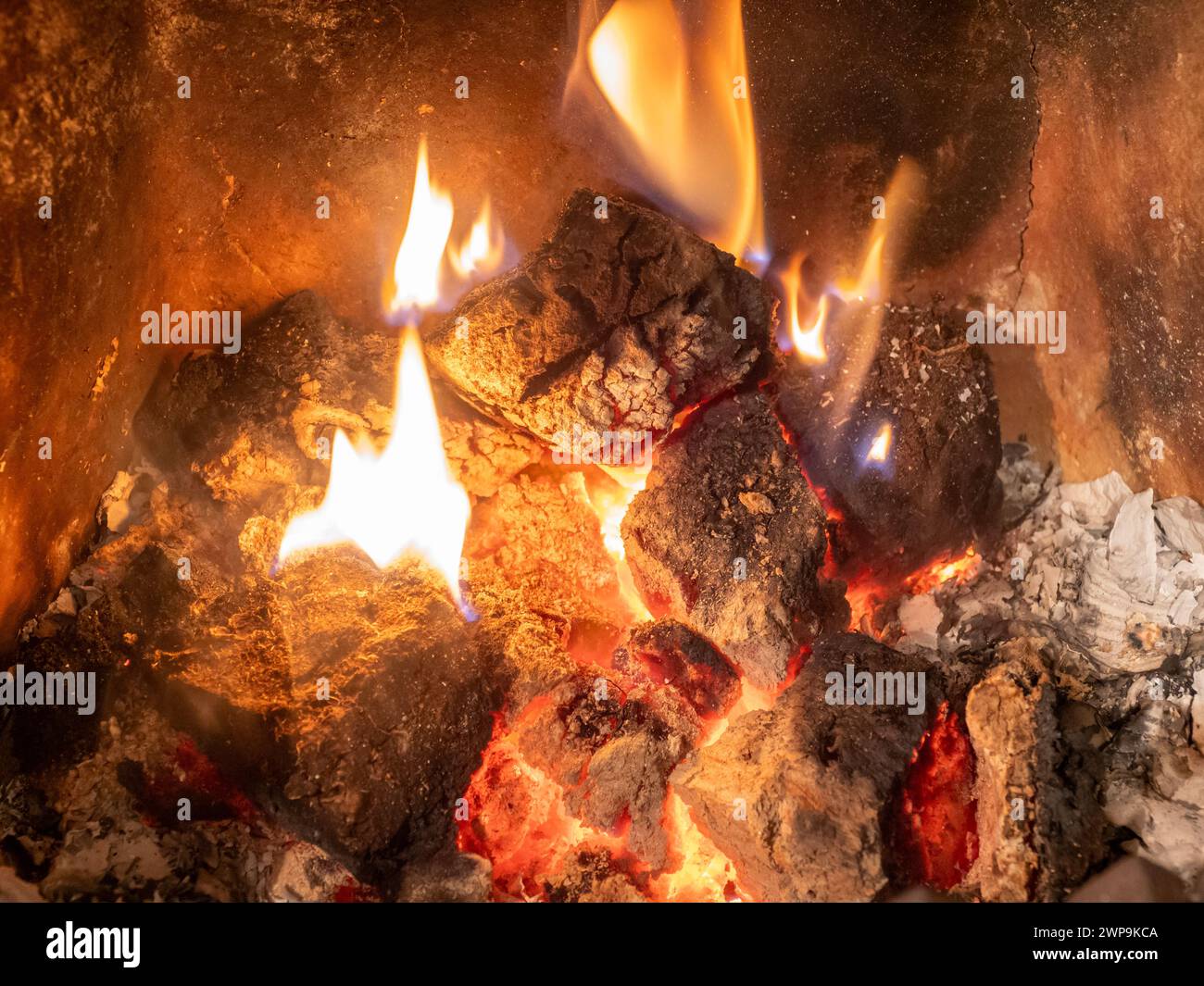 Peat being used as fuel on a house fire in Portnahaven on Islay ...