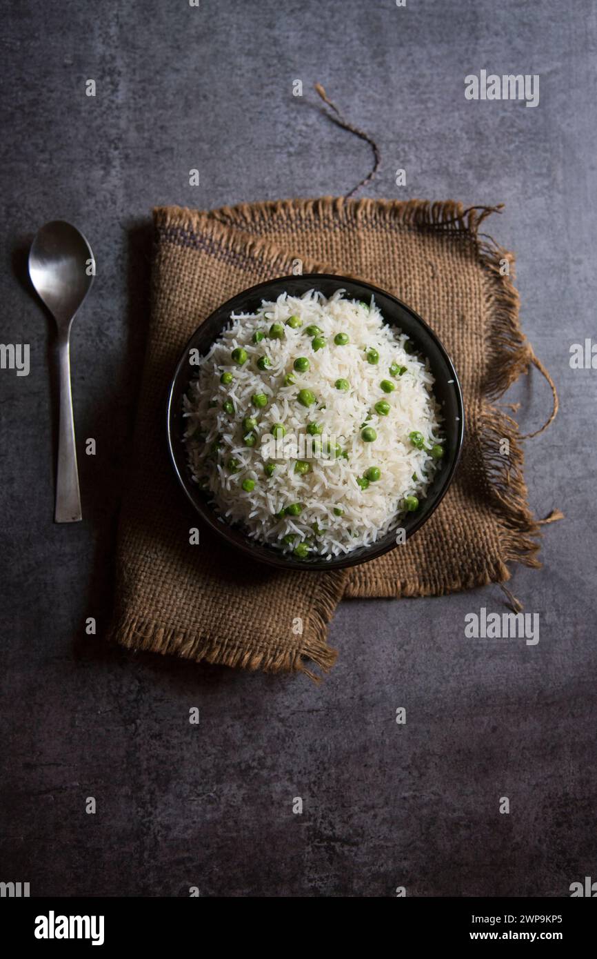 Top view of green peas basmati rice or matar pulao served in a bowl ...