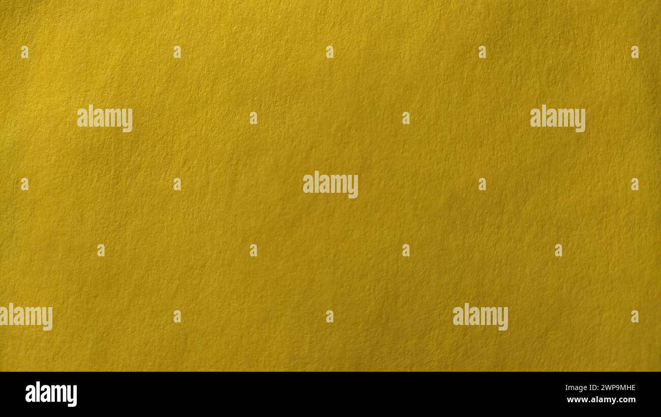 The paper or fabric material is bright yellow. Close-up. Slightly ...