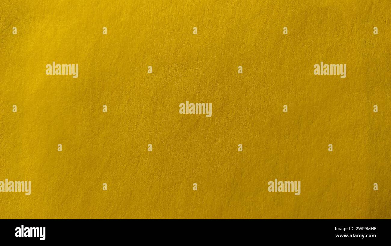 The paper or fabric material is bright yellow. Close-up. Slightly ...