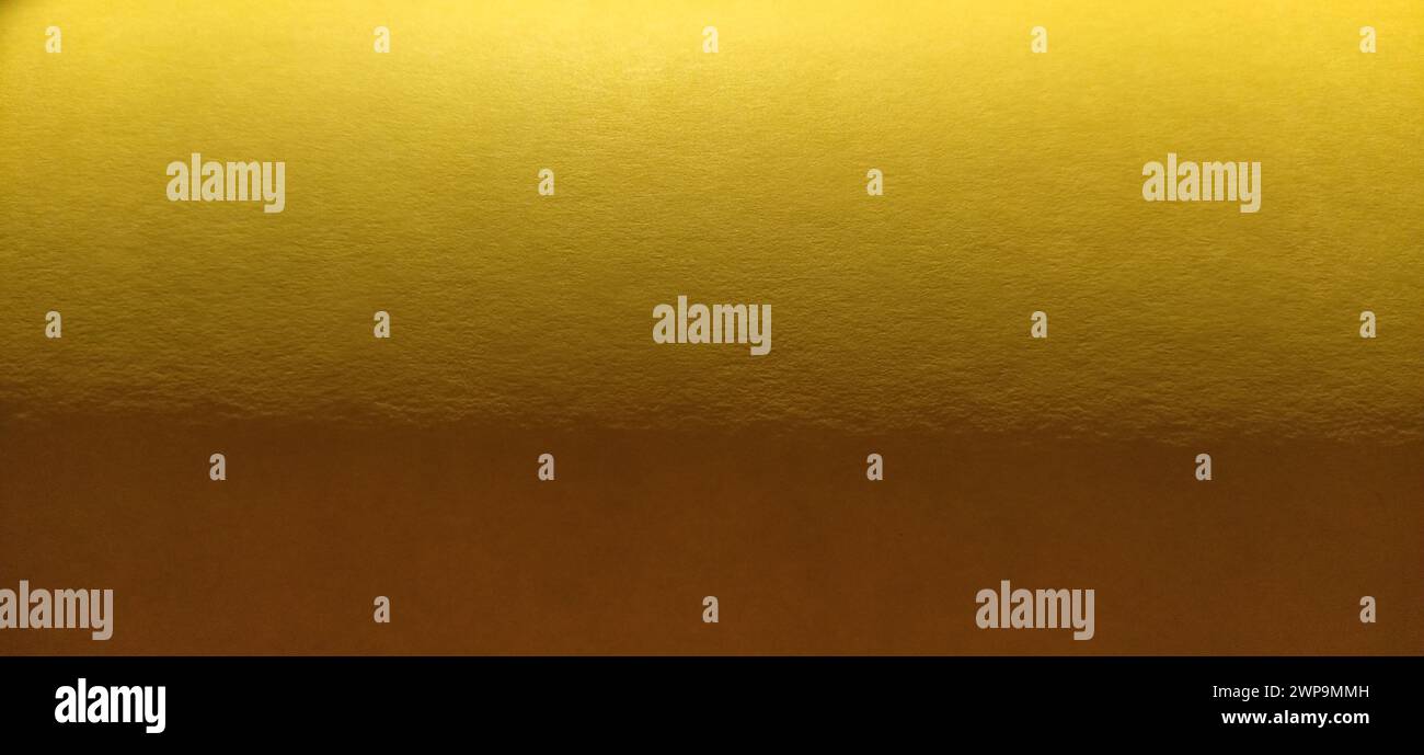 The paper or fabric material is bright yellow. Close-up. Slightly ...