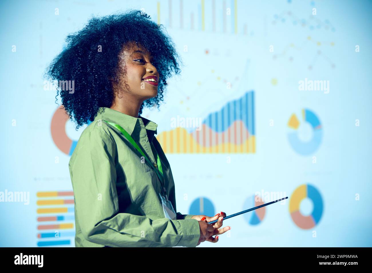 African-American woman presenting statistical data with pointer against ...