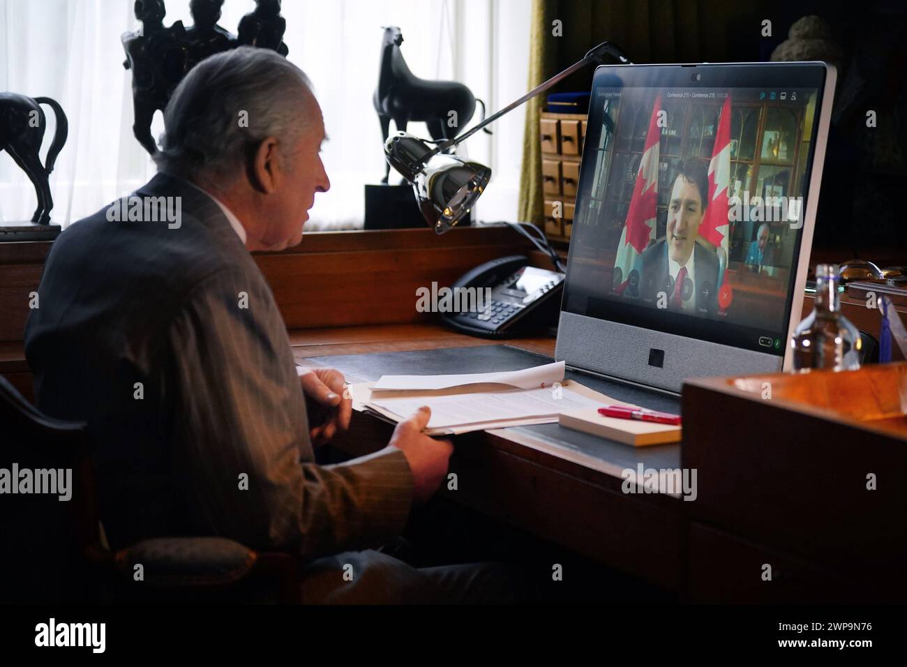 Canadian Prime Minister Justin Trudeau appears on screen via videolink ...