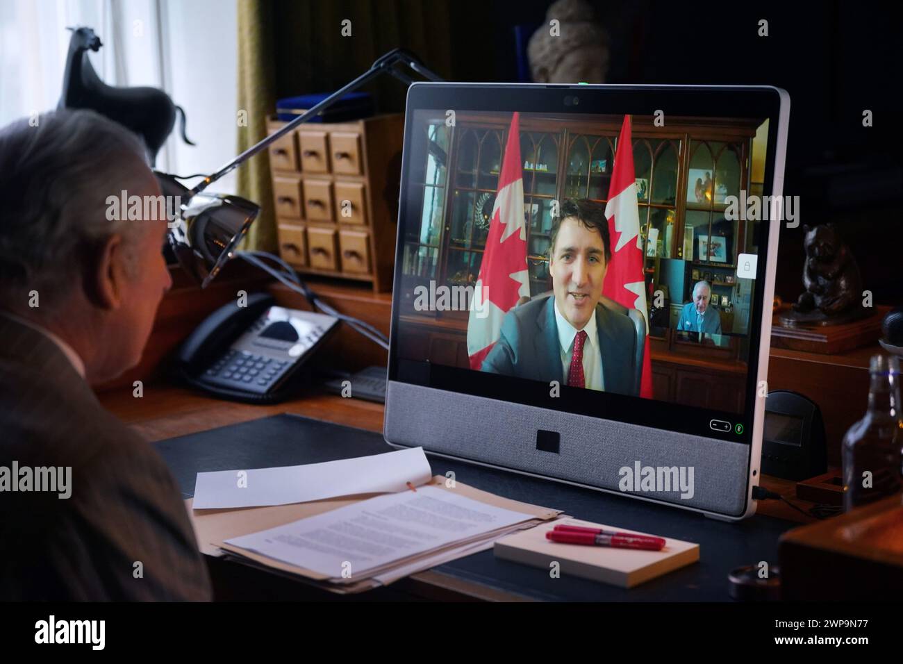 Canadian Prime Minister Justin Trudeau appears on screen via videolink ...